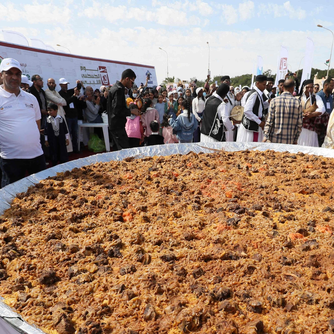 Libyan chefs cook up giant couscous