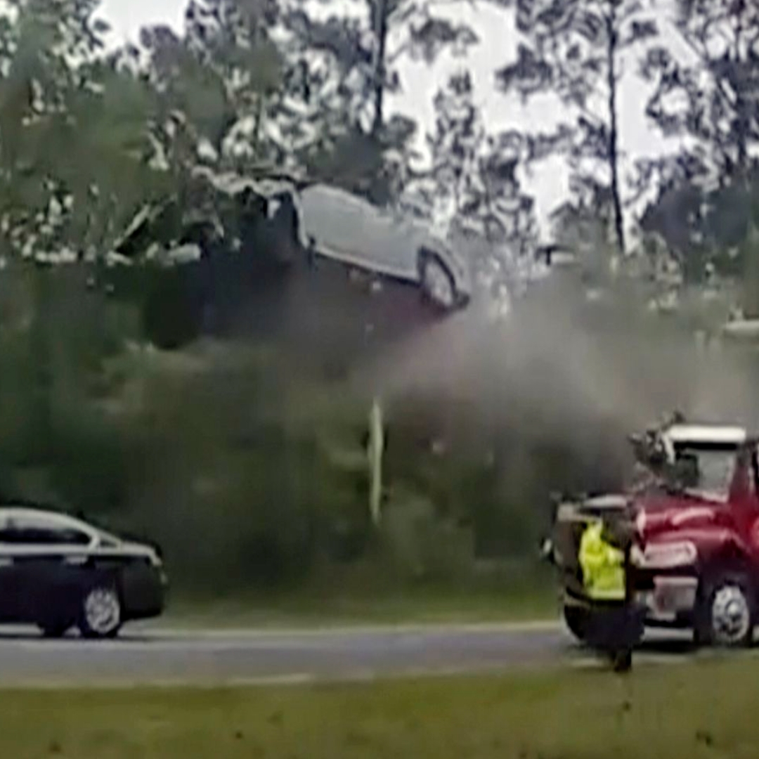 Moment Car Flies Through The Air After Hitting Towing Vehicle In Us