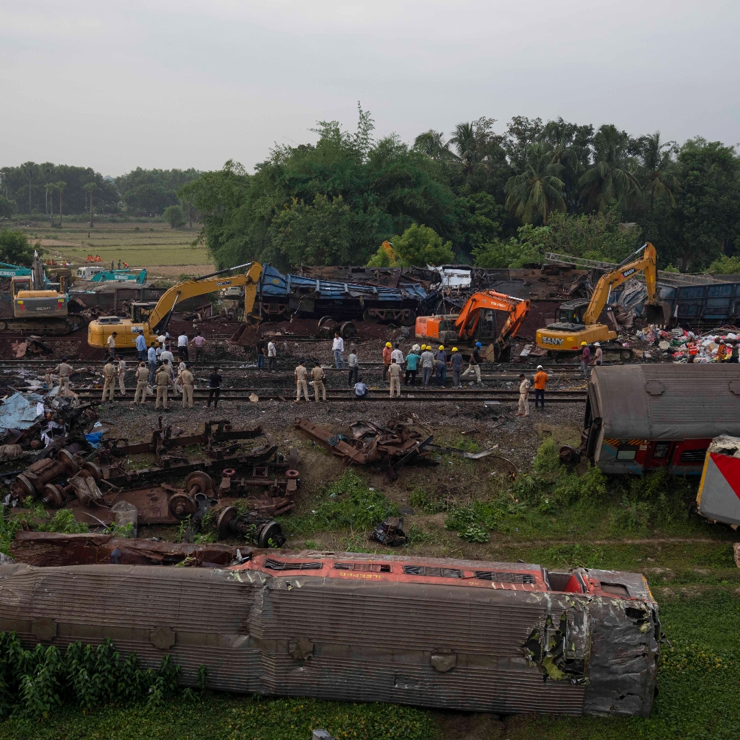 India train crash: Drone video shows massive wreckage clean up operation