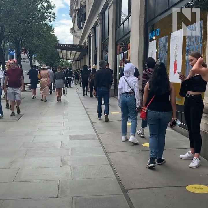 Thousands queue outside stores as shops in England reopen after ...