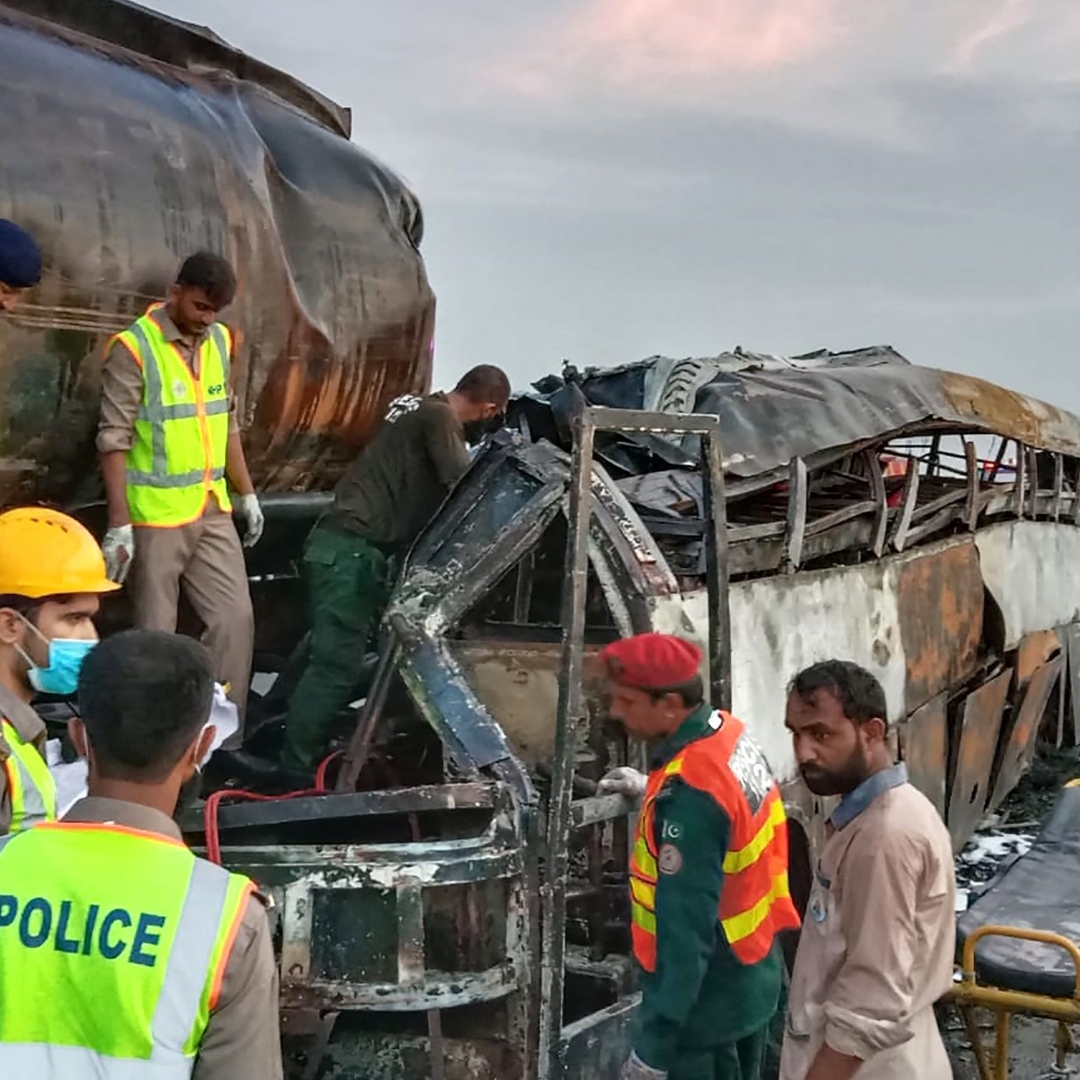 At least 20 killed in Pakistan bus accident and fire