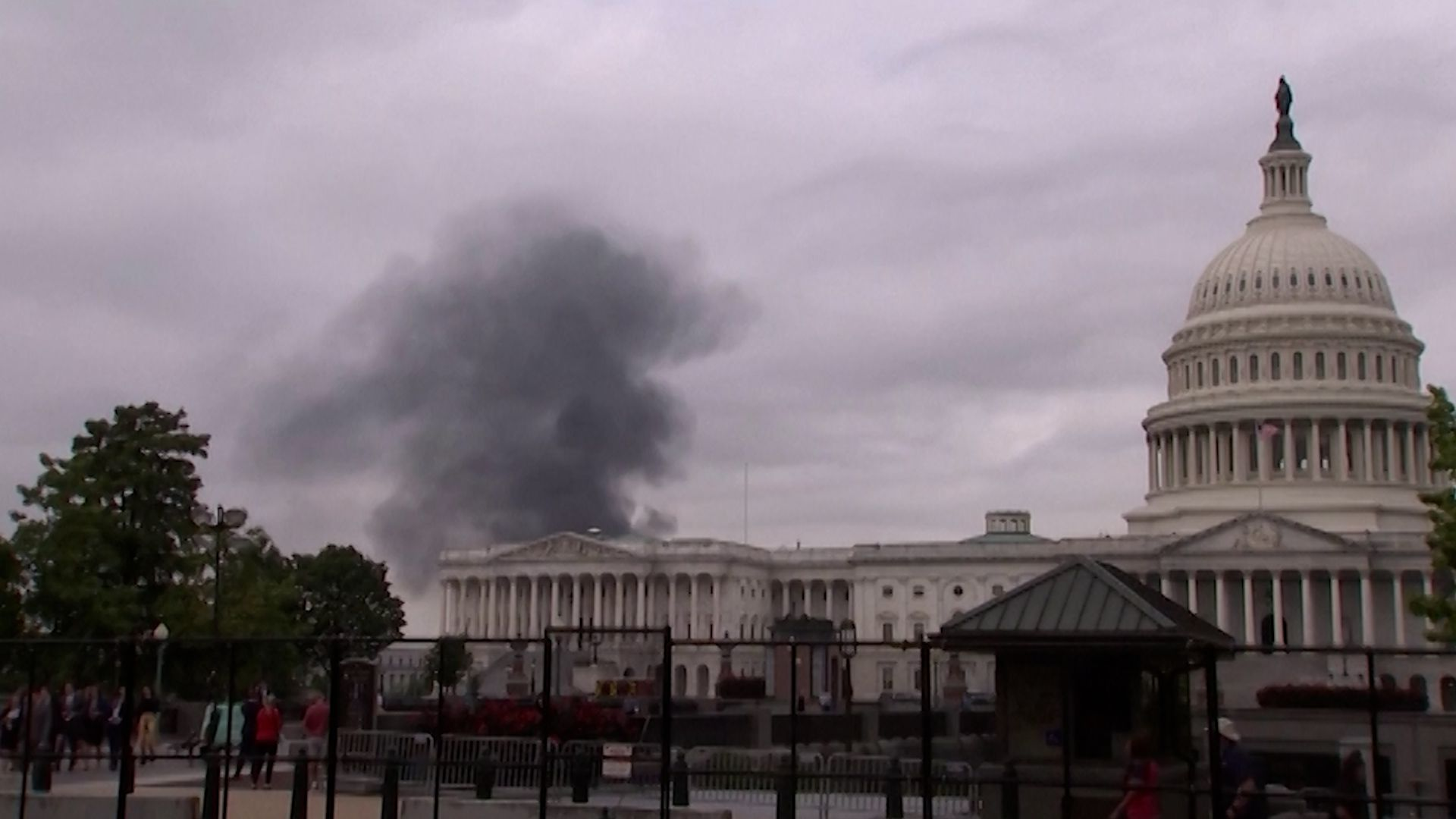 Smoke appears to billow from US Capitol