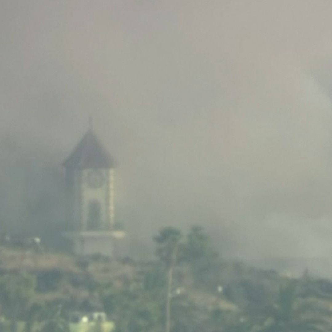 Dramatic moment lava from La Palma volcano collapses church tower