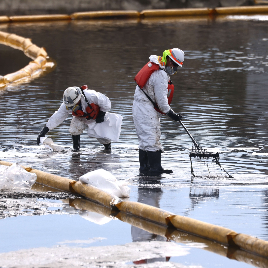 Oil spill clean-up efforts began more than 12 hours after first reports
