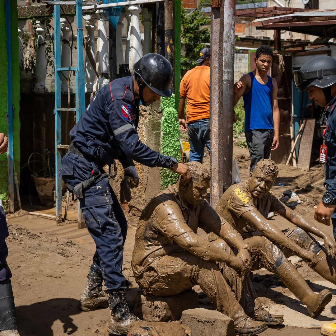 Dozens killed in Venezuela after landslides sweep away homes and shops