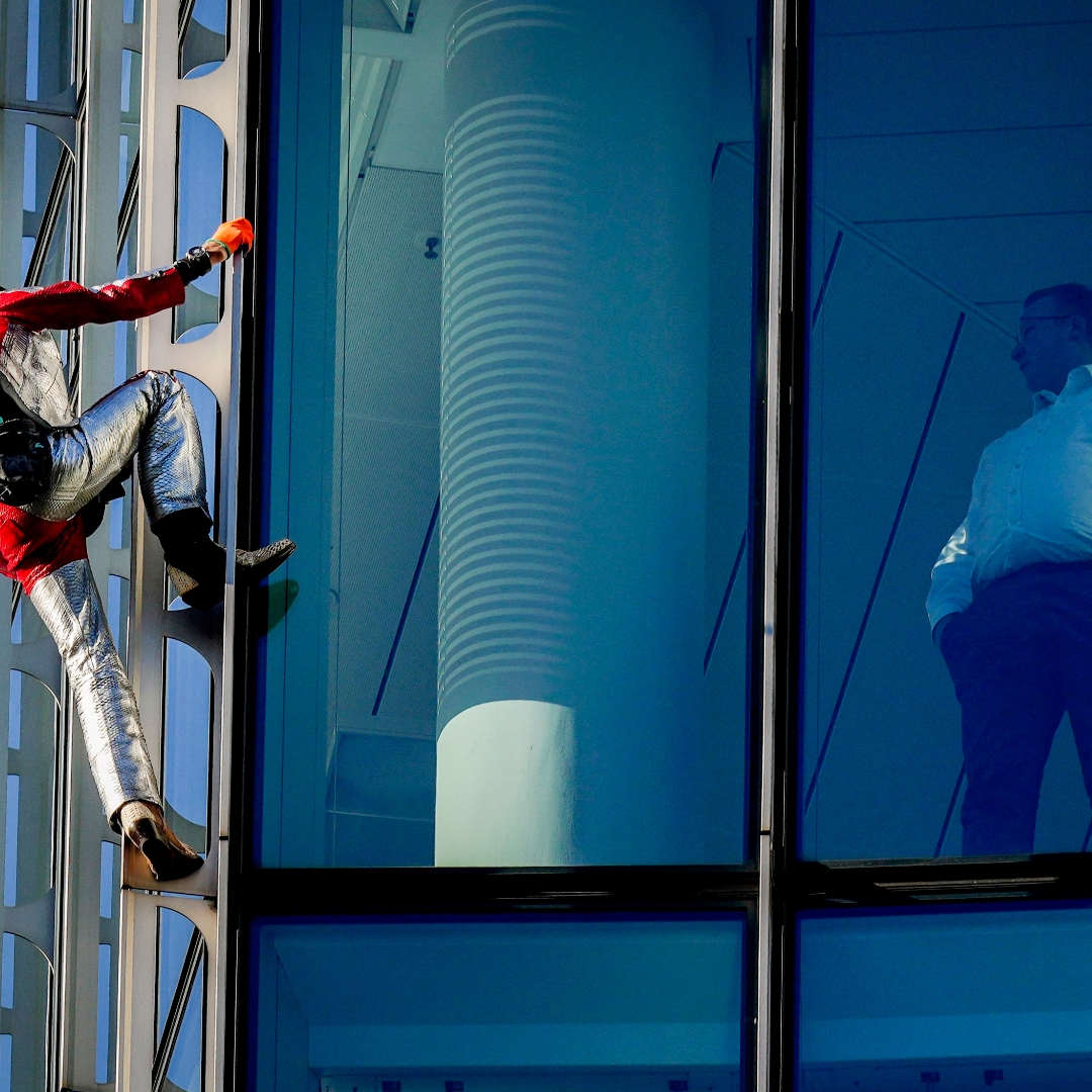 French urban climbers scale German skyscraper