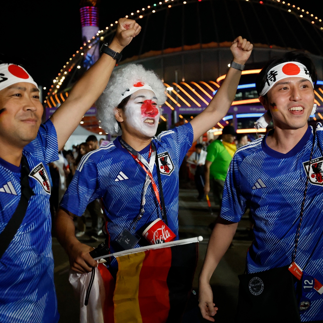 Fans of Japan celebrate after win over Germany